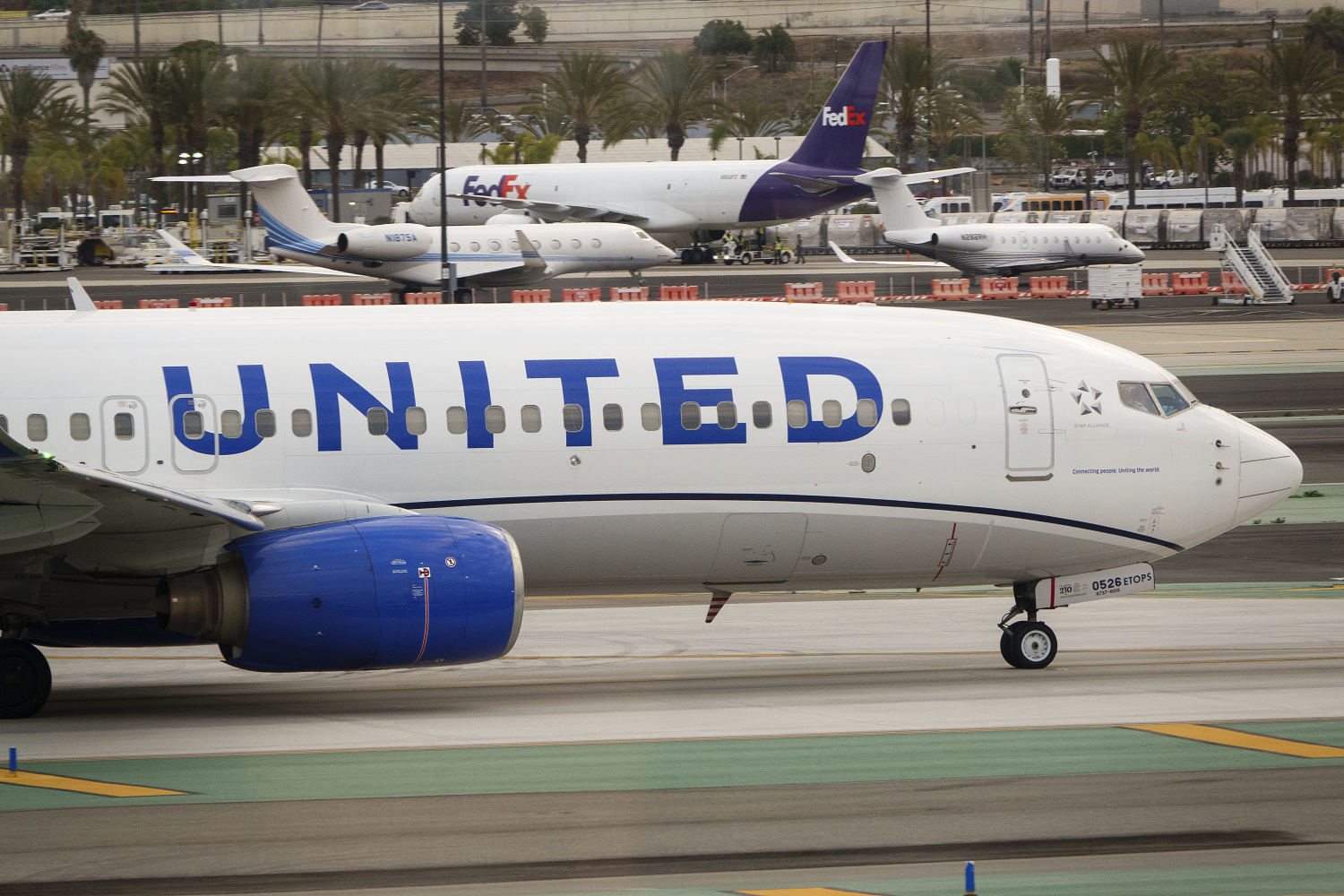 United Airlines plane diverted and unruly passenger detained after in ...