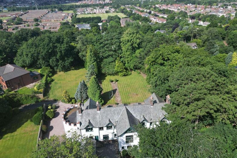 Modern 'castle' with massive garden and bright green bathtub up for ...
