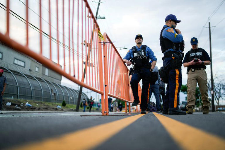 New Jersey state police assert control outside migrant detention center