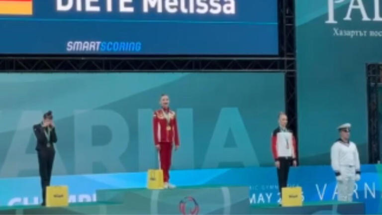 Ukrainian gymnasts make protest gesture during medal ceremonies at ...