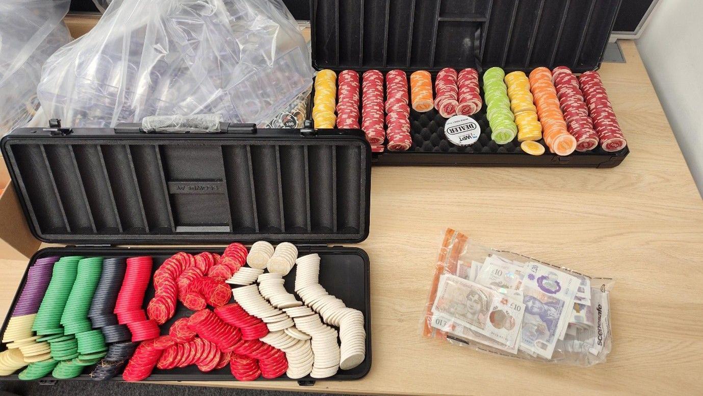 Two arrested as police raid illegal gambling den