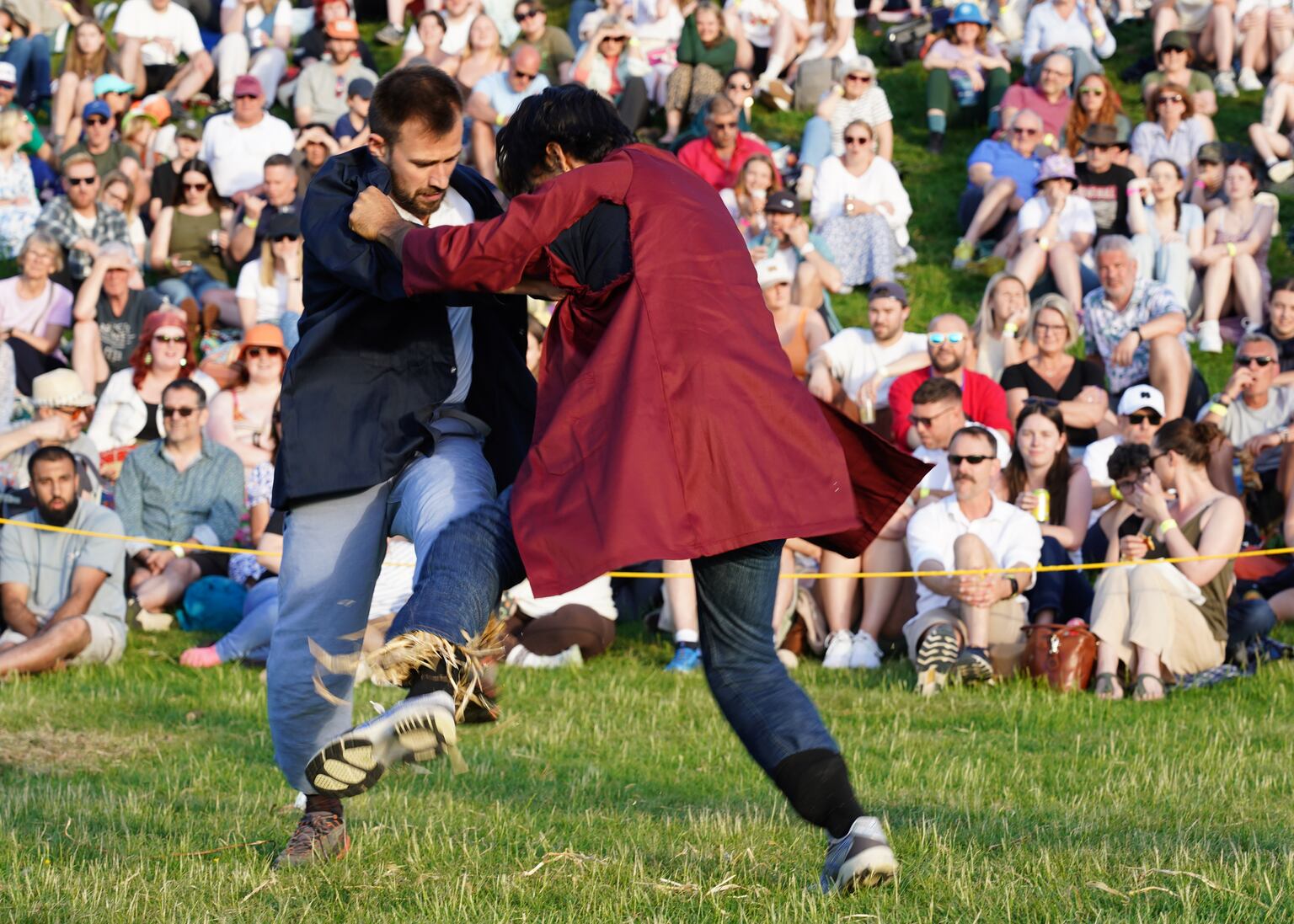 Straw flies as shin-kicking champion crowned at ancient rural games
