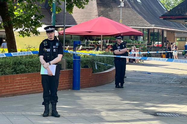 Trader left in shock as police swarm Woodley precinct