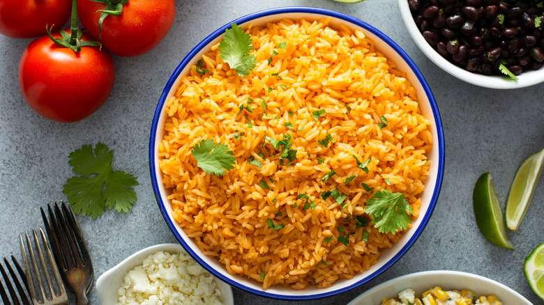 Add tomato juice before the broth when making arroz rojo