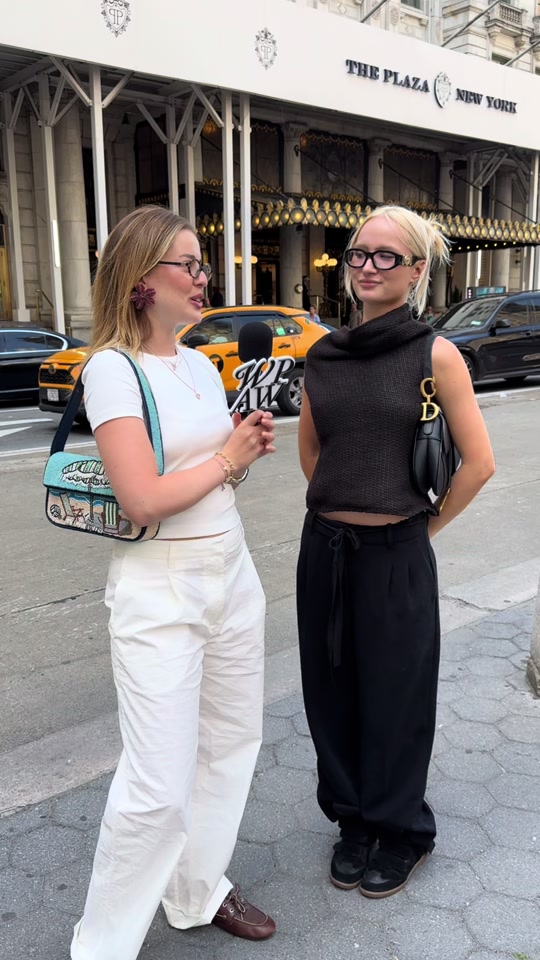 Parisian student rates New York style outside the Plaza