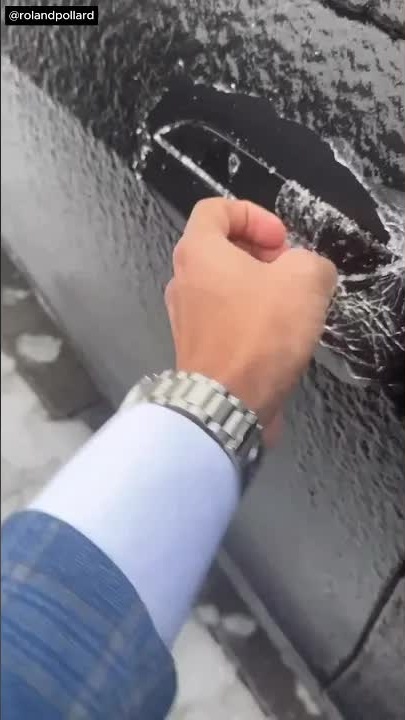 Tesla owner's winter woes: Frozen doors and frozen fun!