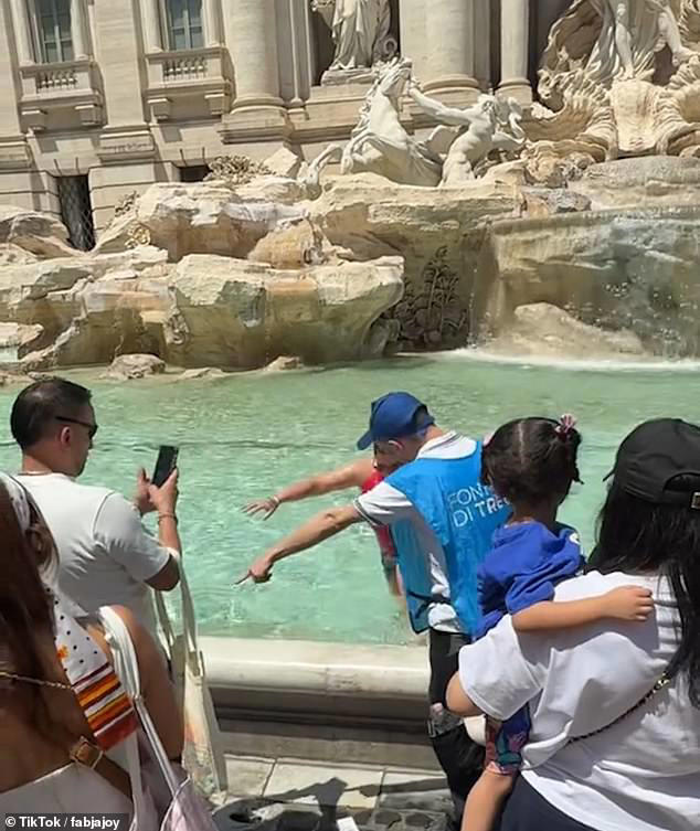 Another tourist goes for a swim in Rome's Trevi Fountain - before ...