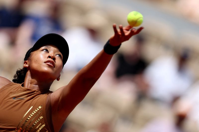 Tennis-gold-sequined Osaka survives three-set scare against teenager Jovic