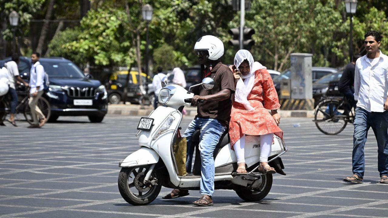 In photos Mumbaikars reel under intense heat as temperatures hover at ...
