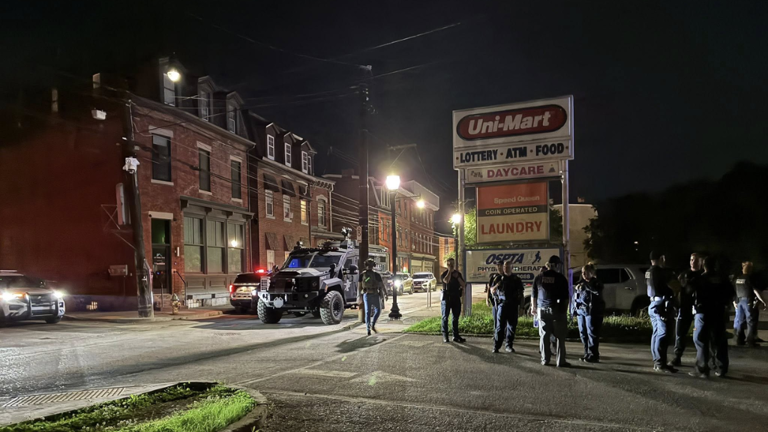 Woman hurt, man taken into custody after late-night SWAT standoff in ...