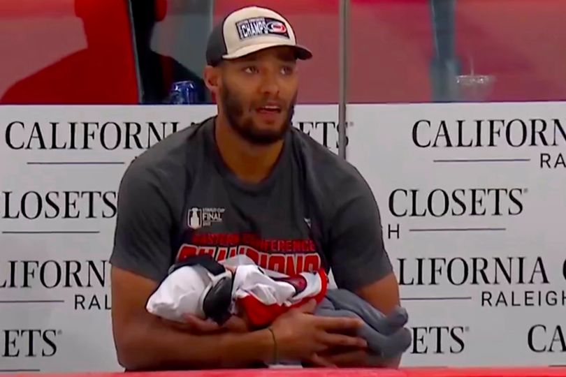 Hurricanes star celebrates with newborn baby on bench after sealing ...