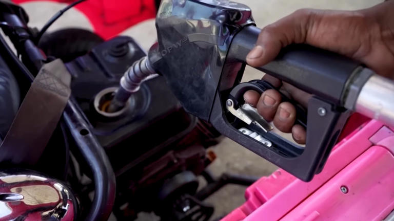 Georgia man says $90 gas fill-ups are 'too much,' drives pink toy car ...