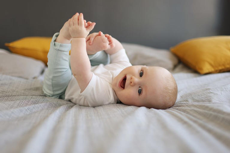 Why do humans grow so slowly compared to other animals?