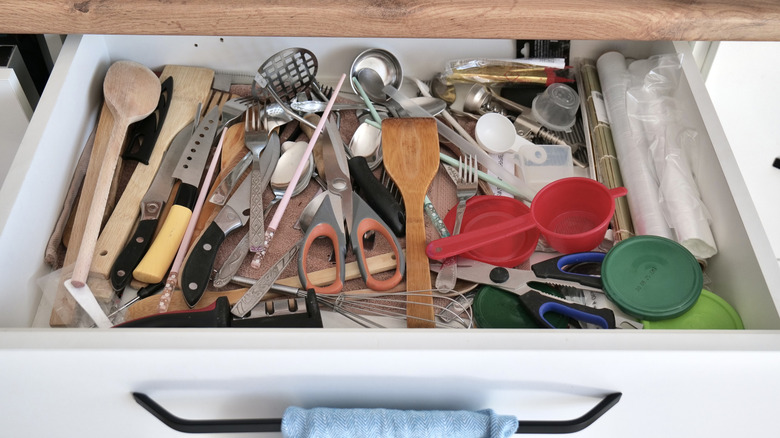 Repurpose paper towel rolls into a simple kitchen utensil organizer