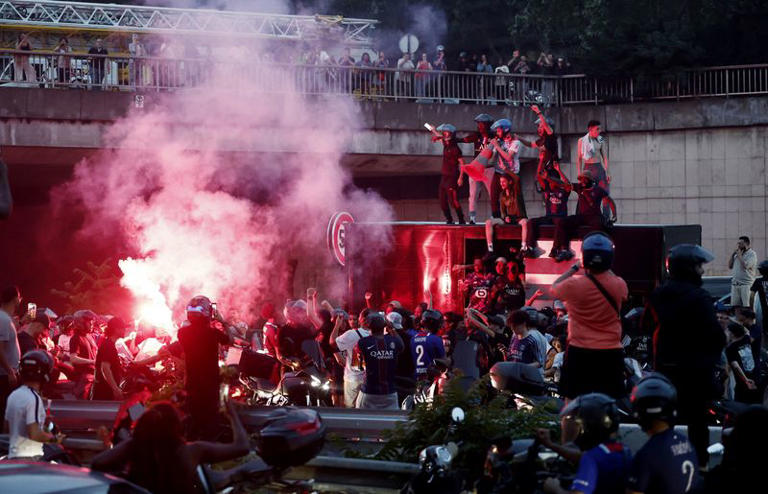 Jubilant PSG supporters spill onto Paris streets, some clashes with police