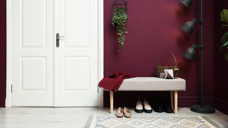 Turn an old shoe rack into an entryway bench using a few scrap pieces