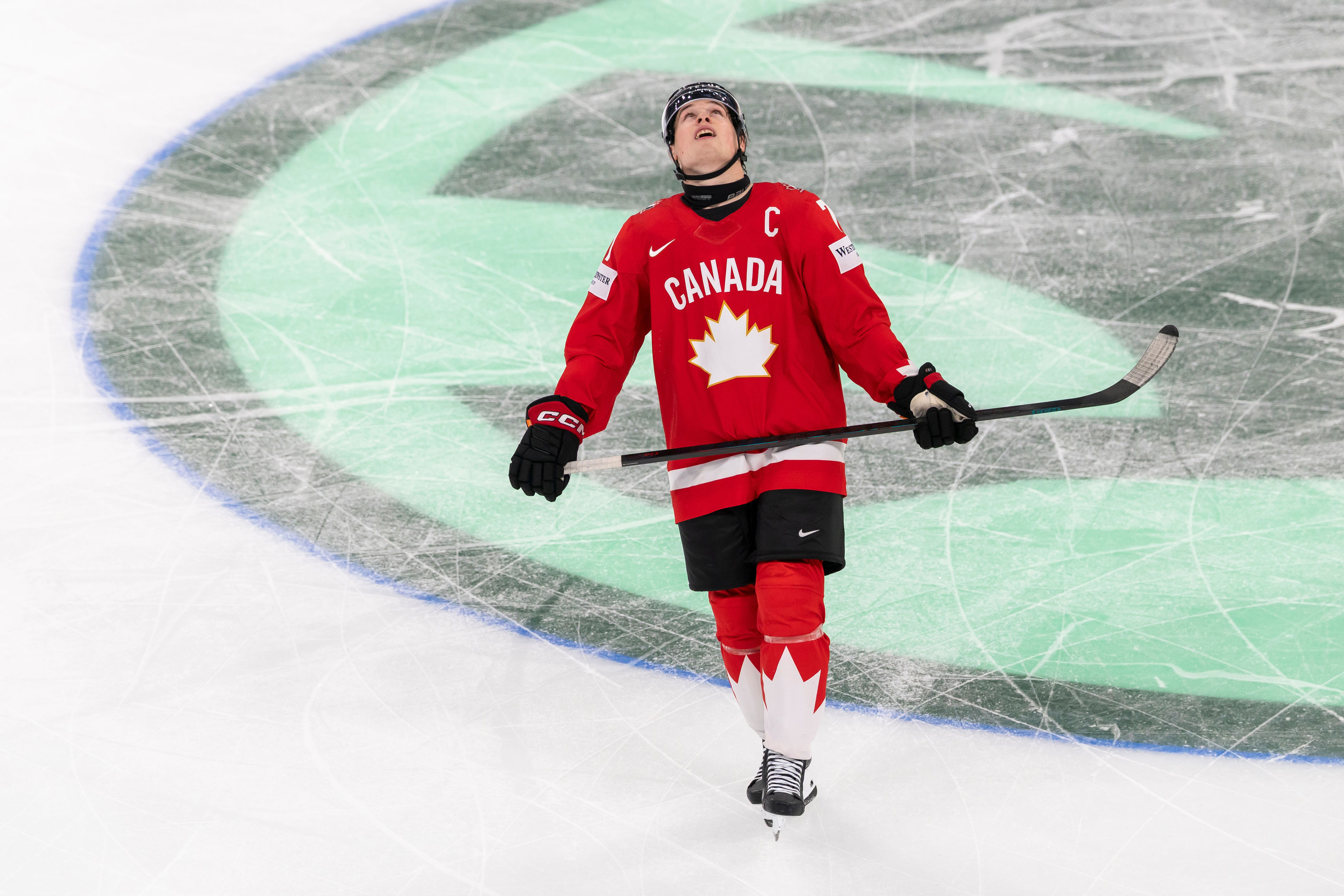 Finland upsets Canada to set up final against Switzerland at ice hockey ...