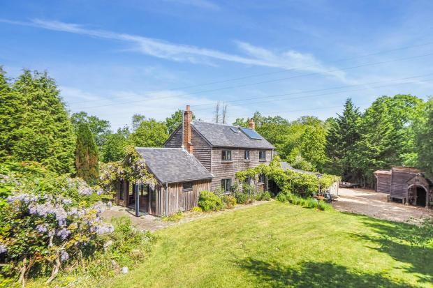 Home set in private grounds with pool and sauna on the market