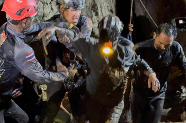 4 miners walk out of Laos mine after water recedes; 2 still missing