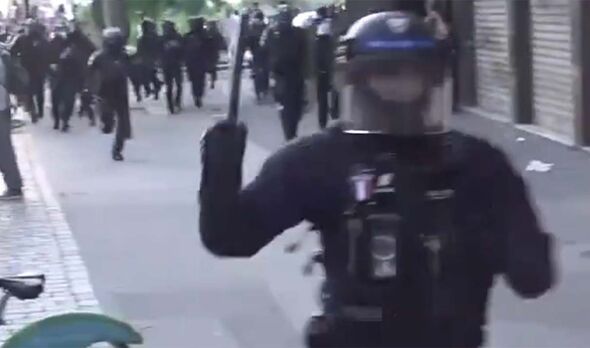Paris in flames as riot police attack PSG fans in furious battles ...