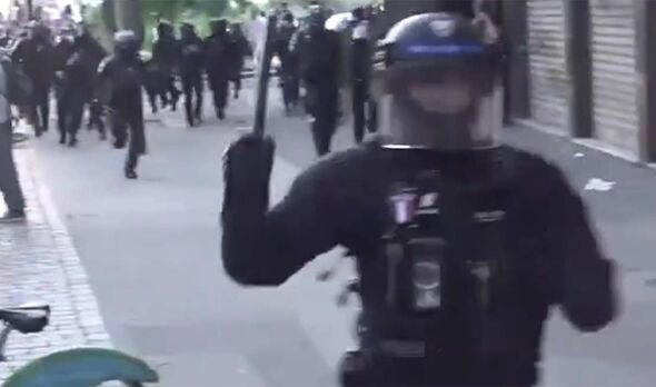 Paris in flames as riot police attack PSG fans in furious battles ...