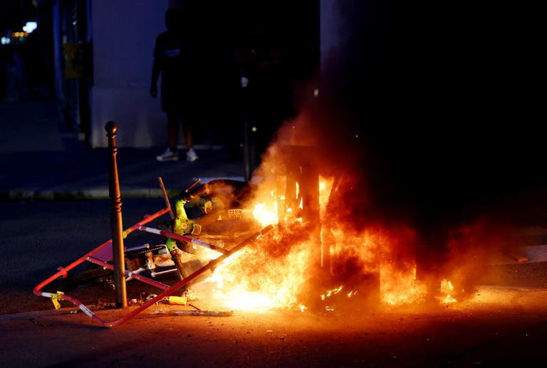 Jubilant PSG supporters spill onto Paris streets, some clashes with police