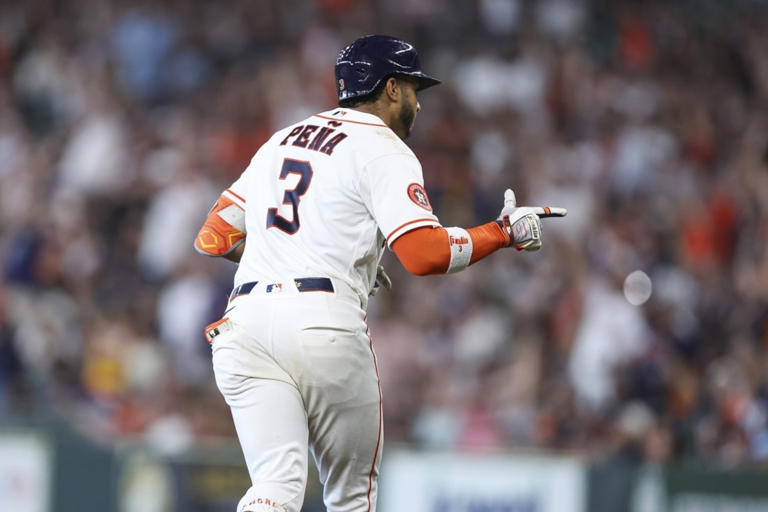 Astros use active bats to cool down Brewers