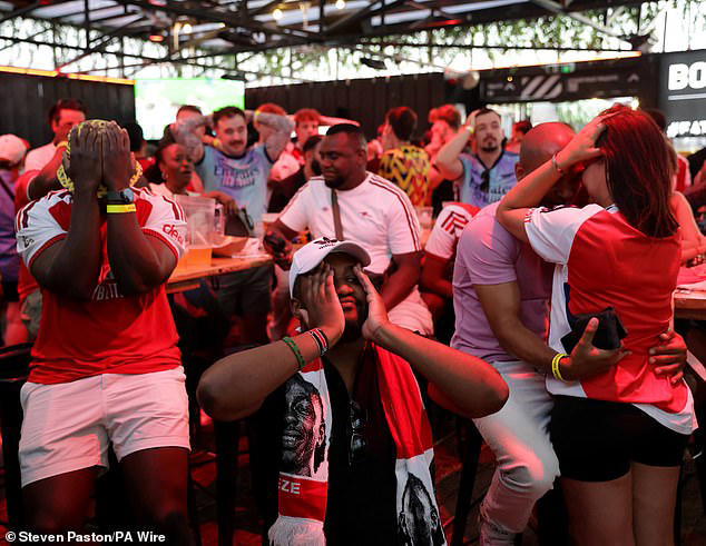 Arsenal fans in despair and players in tears as they lose Champions ...
