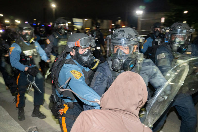 ICE backers join fray, support feds outside Delaney Hall