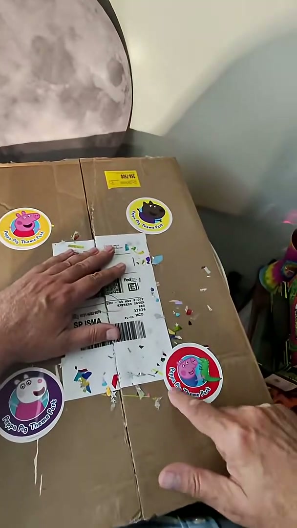 Unboxing a care package from Peppa Pig Theme Park Texas!