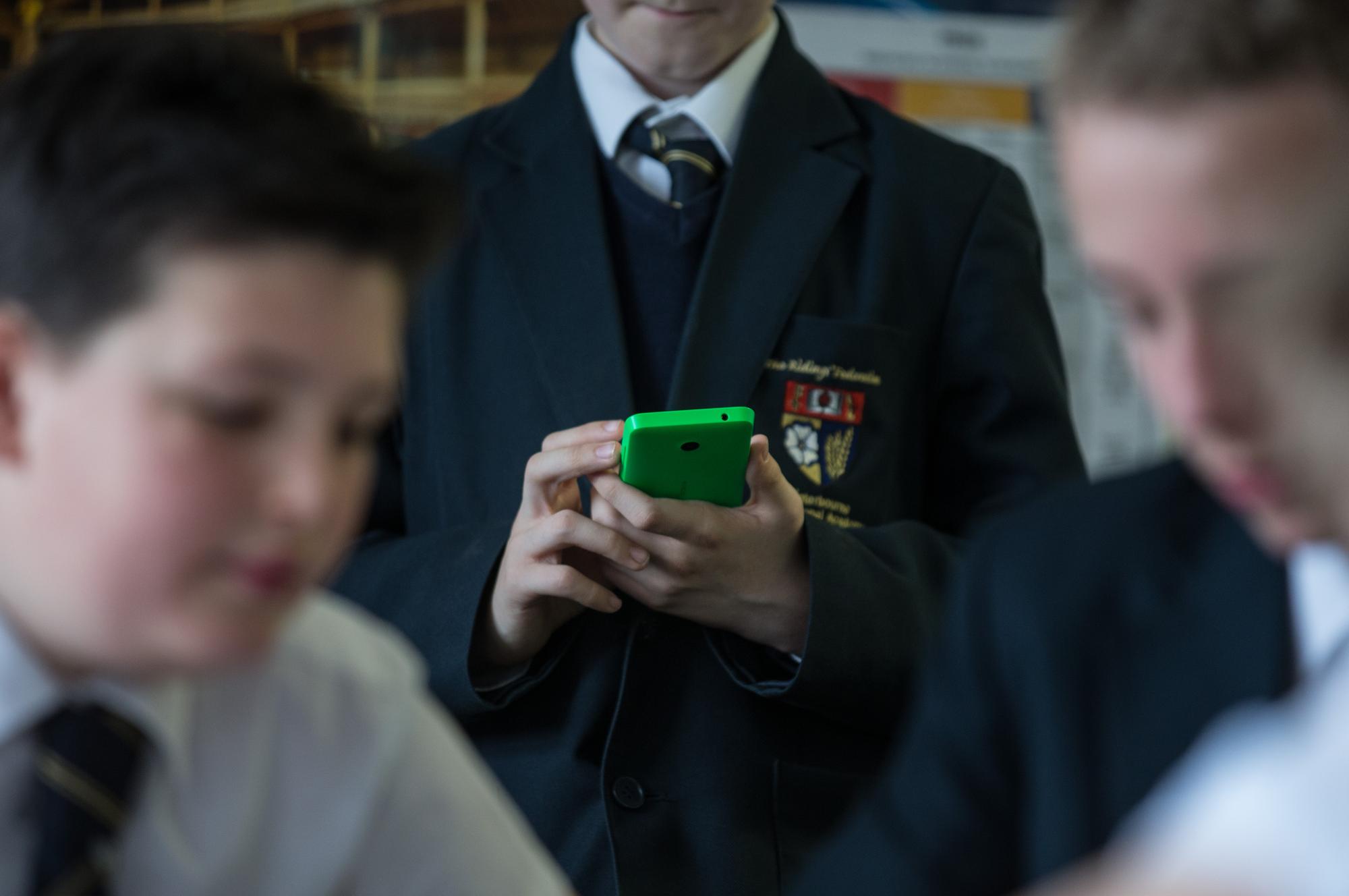 Pupils defend mobile phones as 'essential' for learning at new West ...