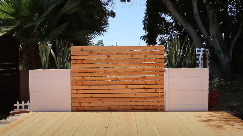 9 wood fence ideas for a stylish and private yard