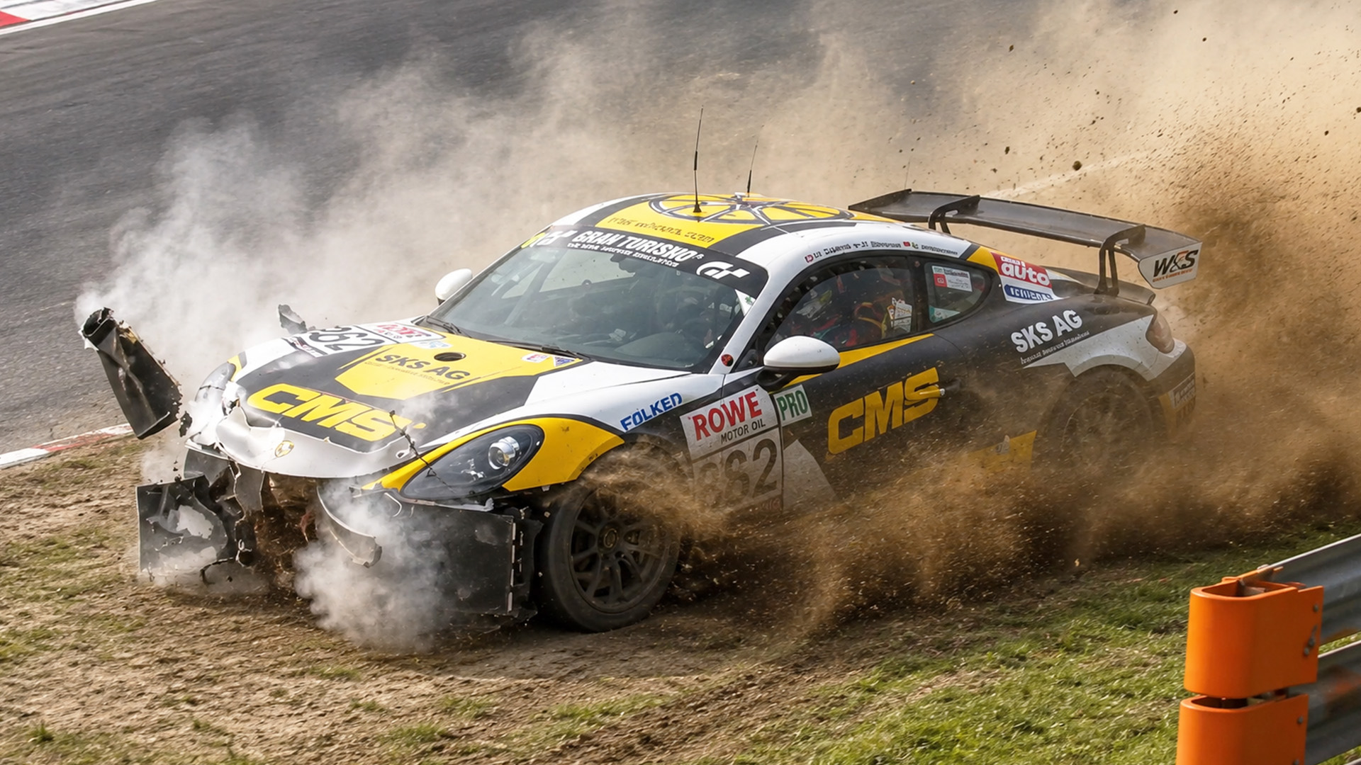 Massive dust and debris explode after Nürburgring racing incident