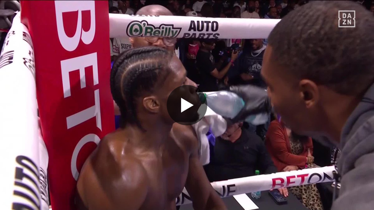 Shocking moment American boxing star is thrown out of the ring in ...