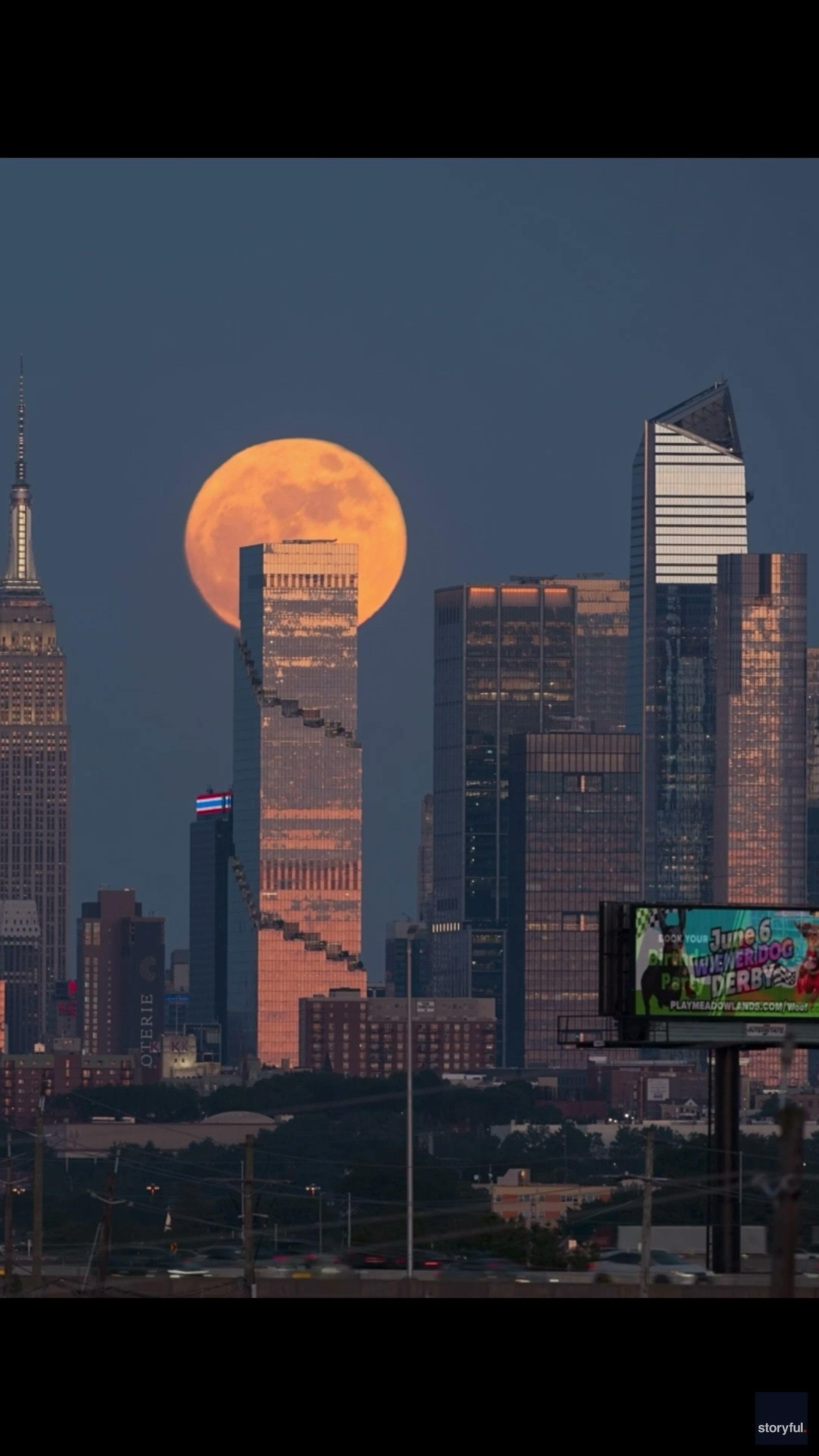 'Blue moon' illuminates skyline as it rises over NYC