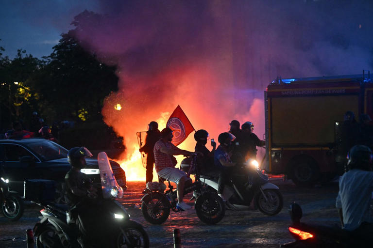 Paris police arrest over 130 people in wild scenes after PSG wins ...