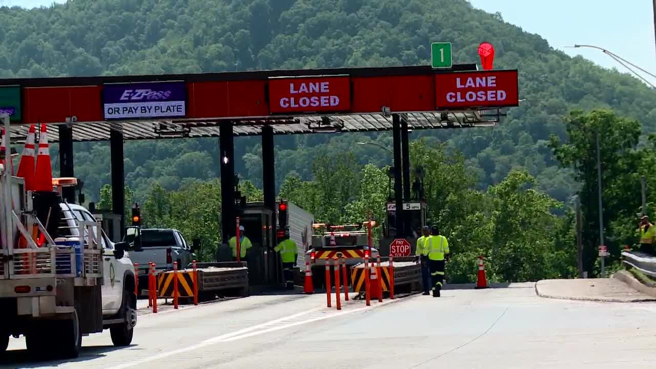 One injured after semi hits toll booth