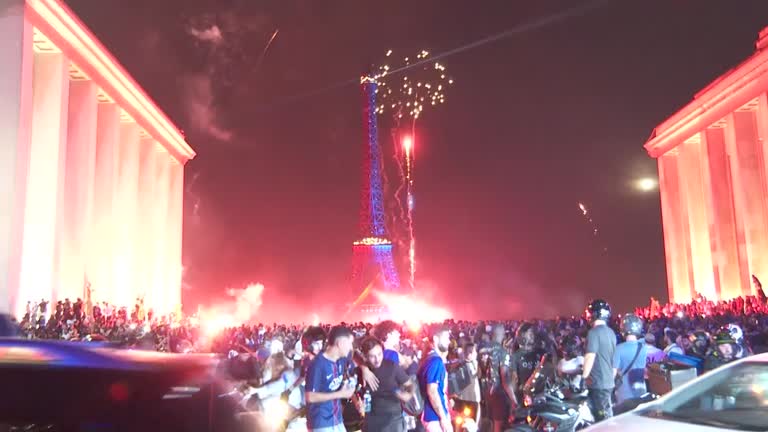Eiffel Tower lights up in PSG colours as fans clash with police