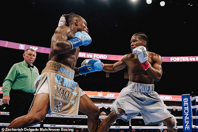Shocking moment American boxing star is thrown out of the ring in ...
