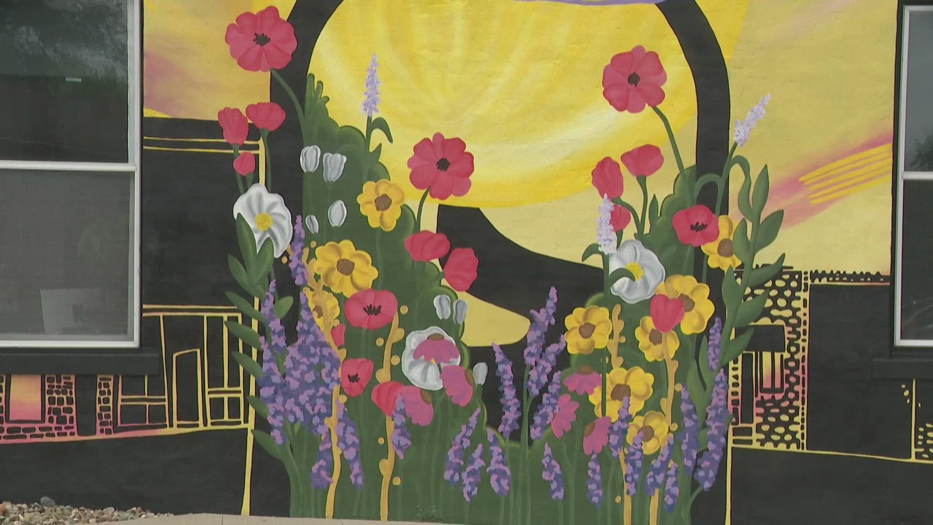 Local artist paints new mural in Grimes
