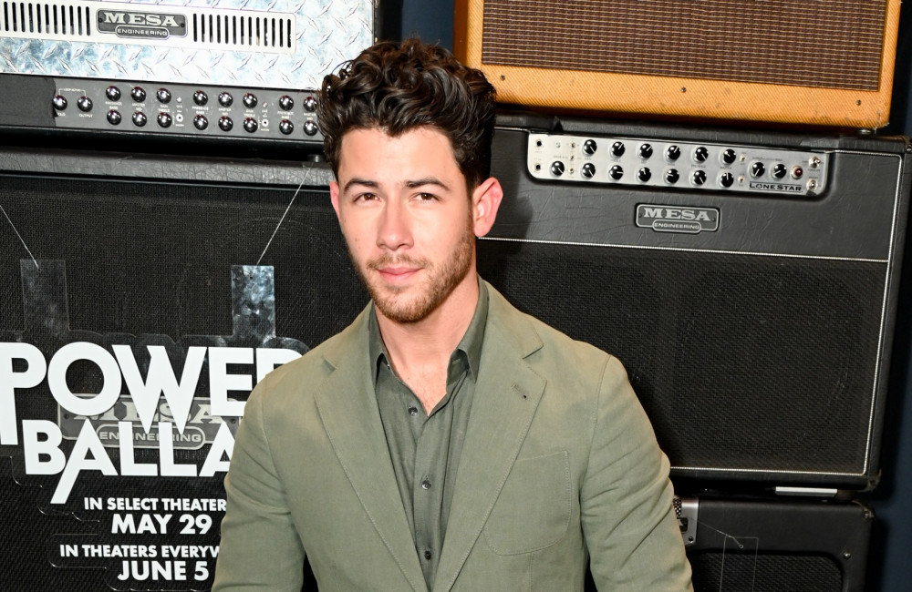 Nick Jonas says he 'might have a little cocktail' before performing