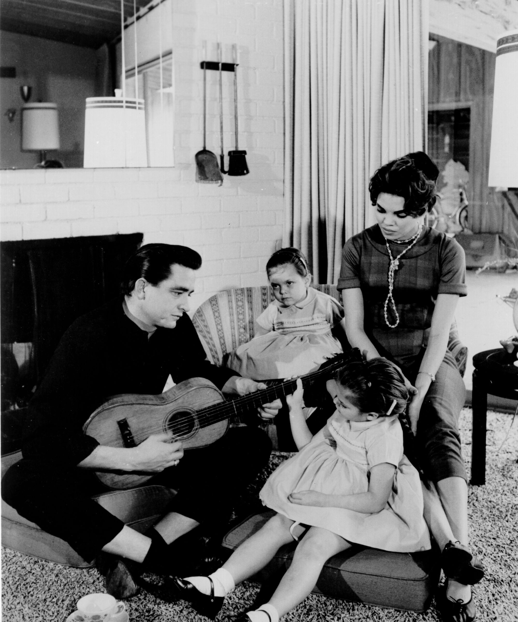 Johnny Cash's '50s shag rug, striped armchair, and white lampshade ...