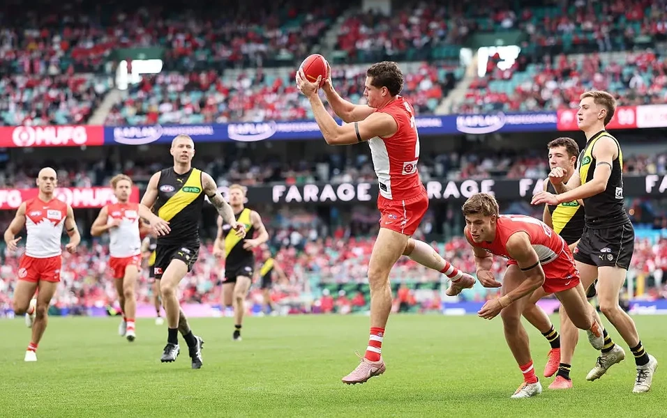 McLean's milestone adds to Swans' forward contest