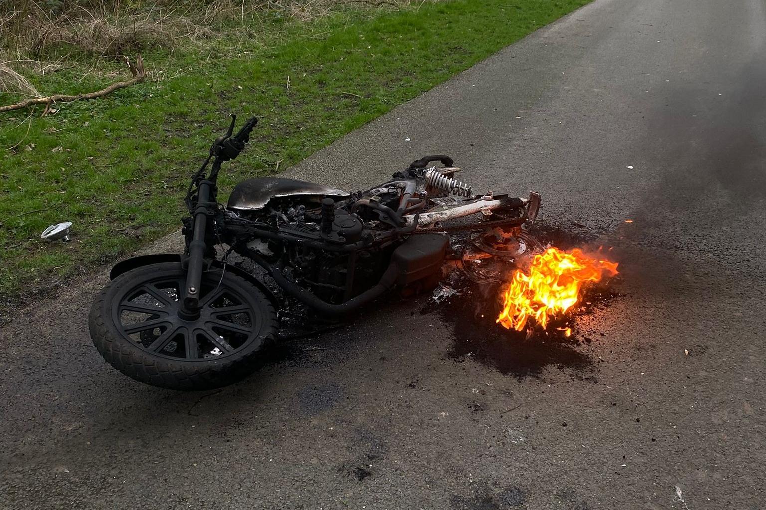 Yobs set motorbike on fire and throw it on Lancaster cycle race track