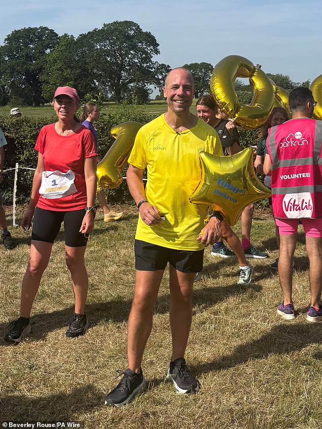 Guard of honour for British runner, 43, becoming first person in world ...