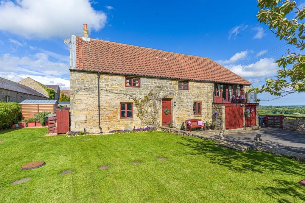 Characterful North Northumberland barn home for sale in rural hamlet
