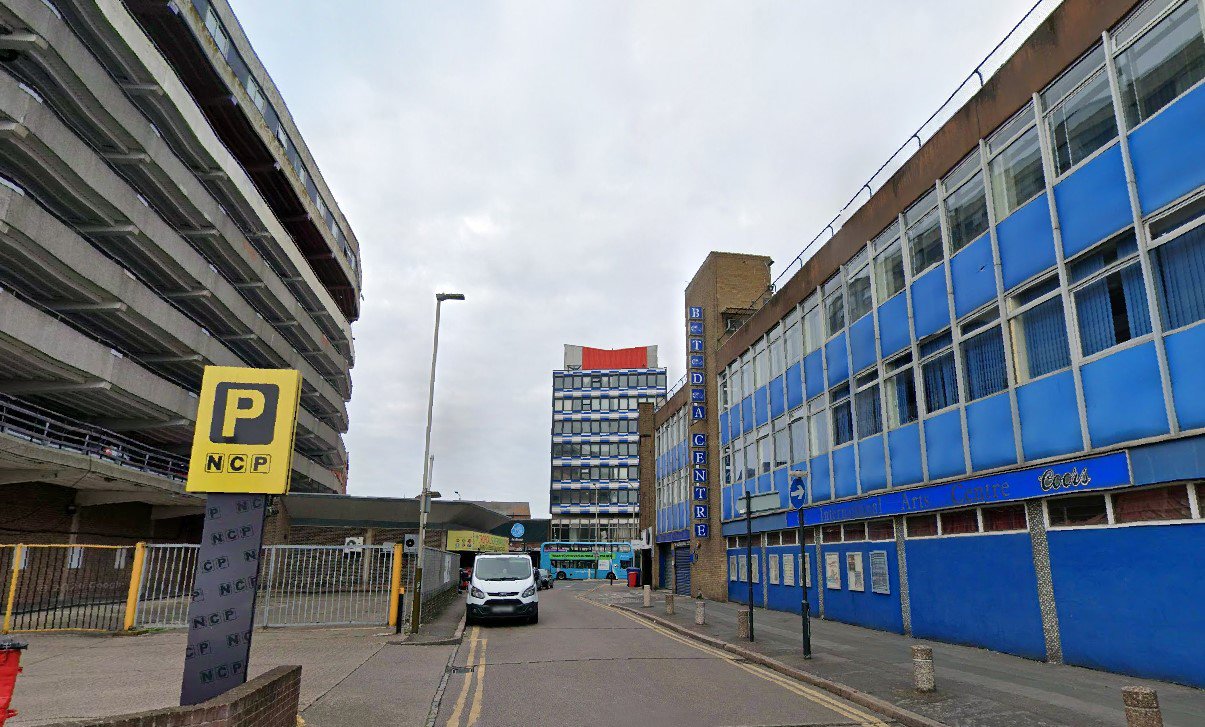 Woman arrested in murder probe after man’s body found in van
