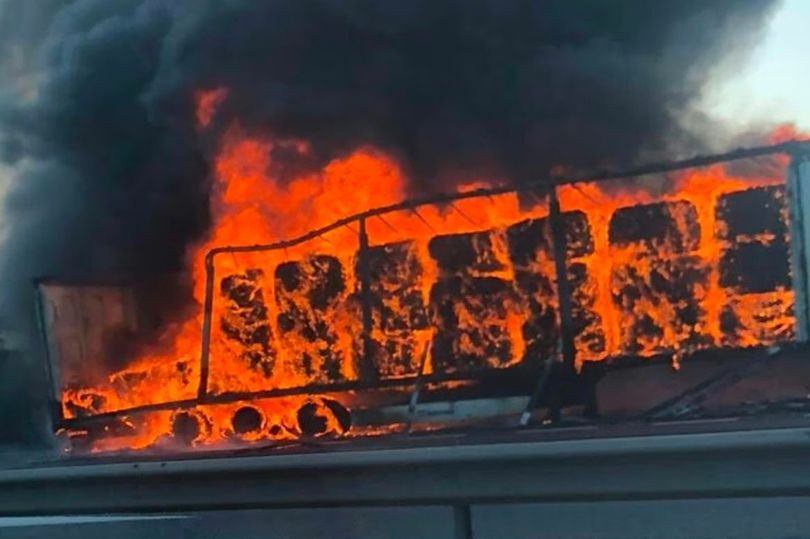 Firefighters share pictures of straw bale lorry blaze on busy road