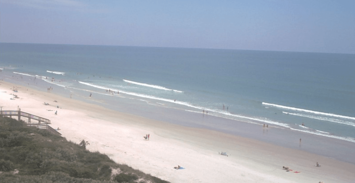 It's famous for its white sands, surf – and being the shark bite ...