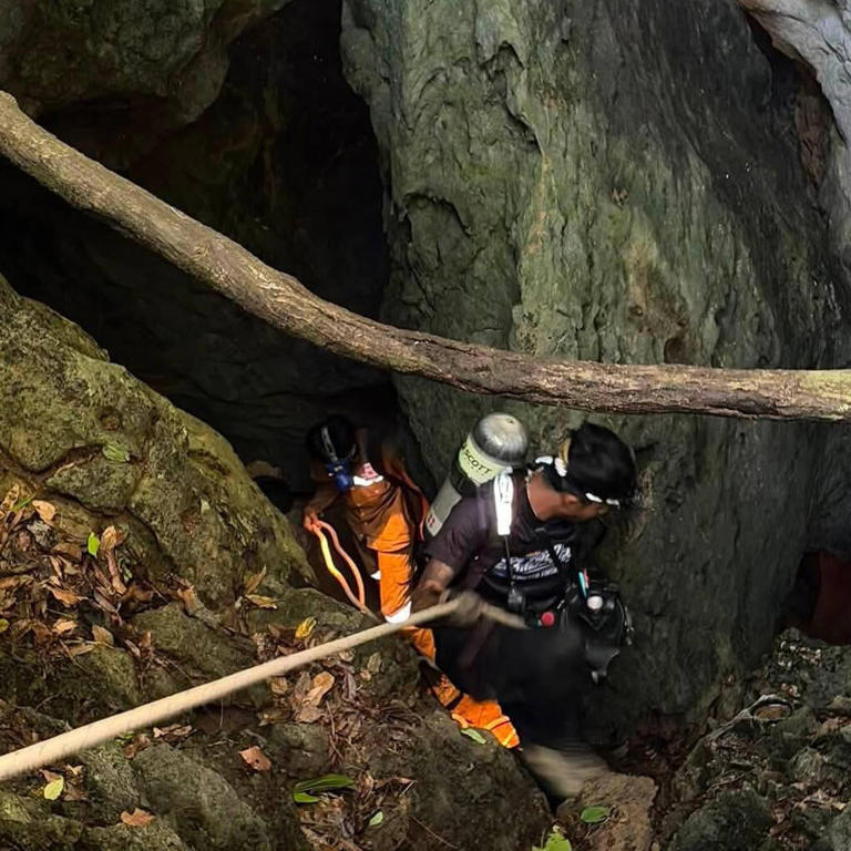 Rain threatens search for 2 gold miners still missing in Laos cave